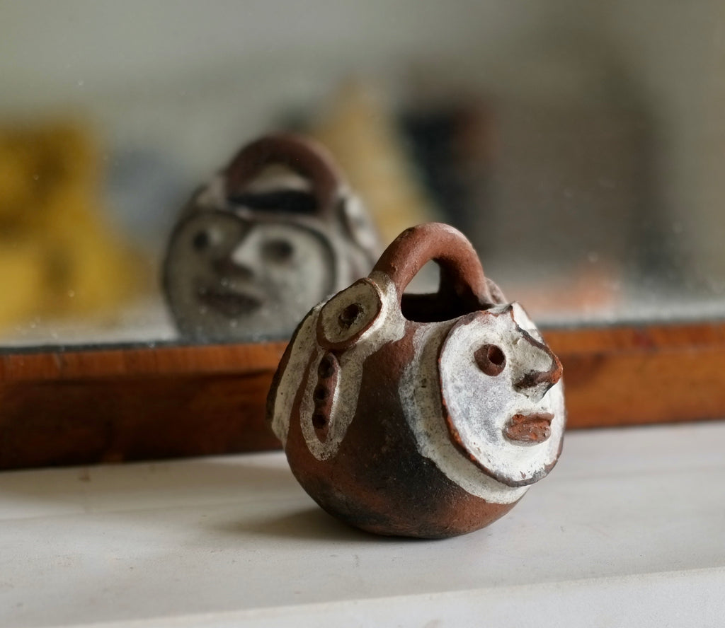 Anthropomorphic Terracotta Pot – punch the clock