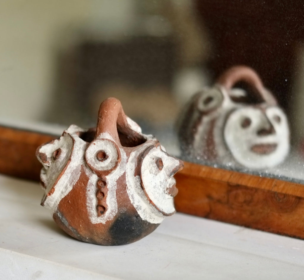 Anthropomorphic Terracotta Pot – punch the clock