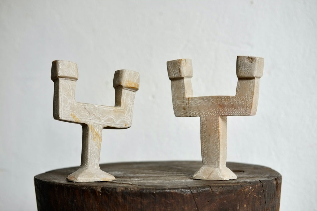 Pair of Carved Stone Candlesticks – punch the clock