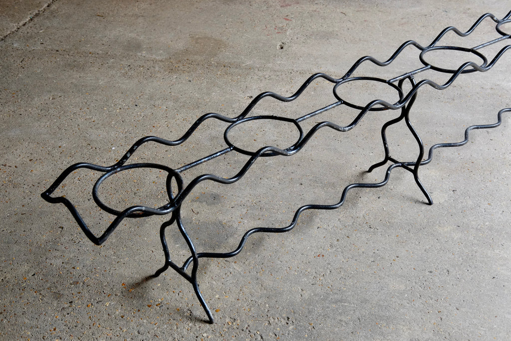 Wavy Metal Plant Stand – punch the clock